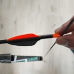 How to nock an arrow - follow these 5 steps - ImproveYourArchery.com