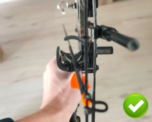 How to nock an arrow - follow these 5 steps - ImproveYourArchery.com
