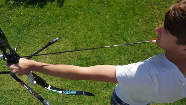 Shooting with a bent vs. straight bow arm - ImproveYourArchery.com